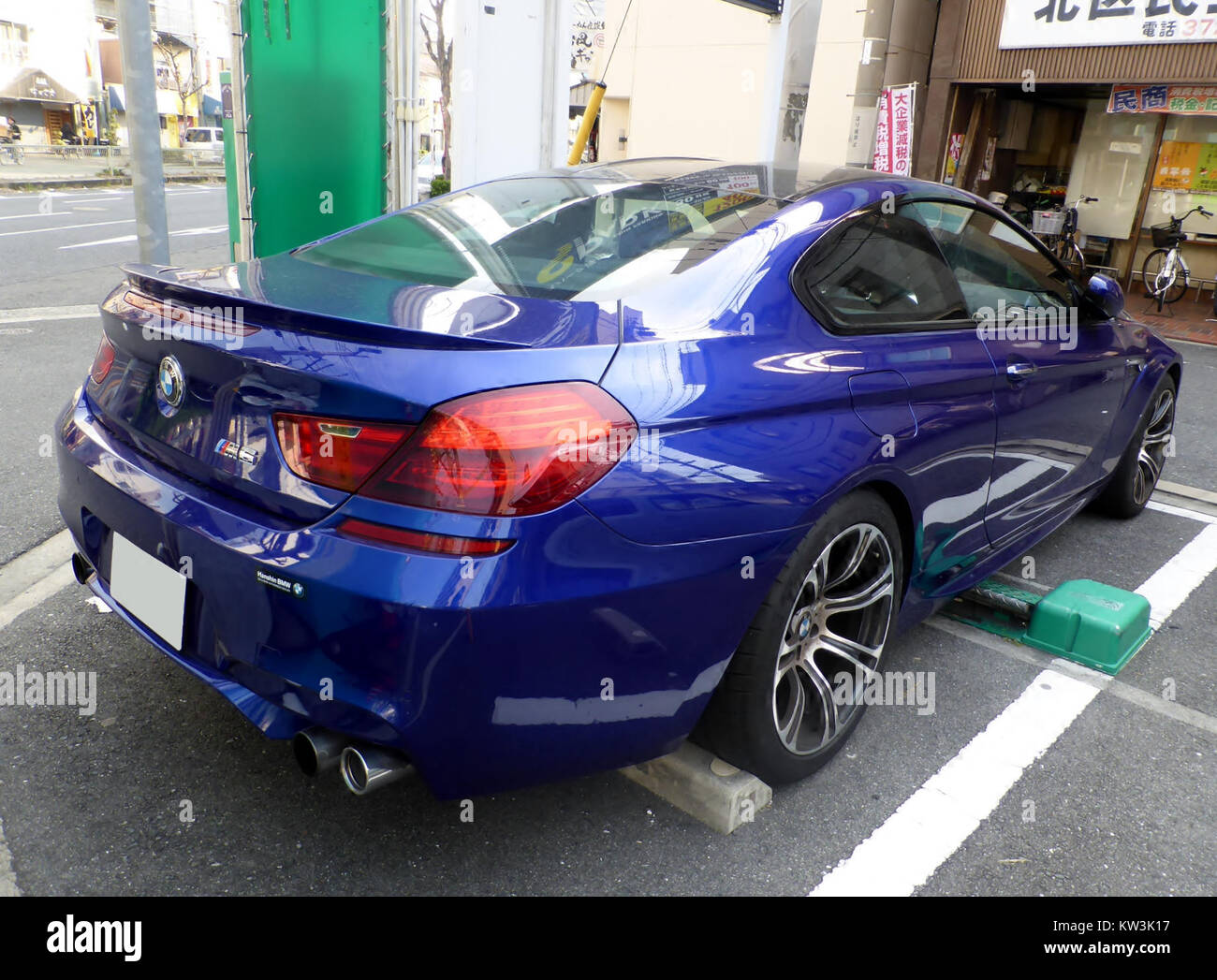 The BMW M6 Coupe (F13) rear view showcases the vehicleâ€™s sporty ...