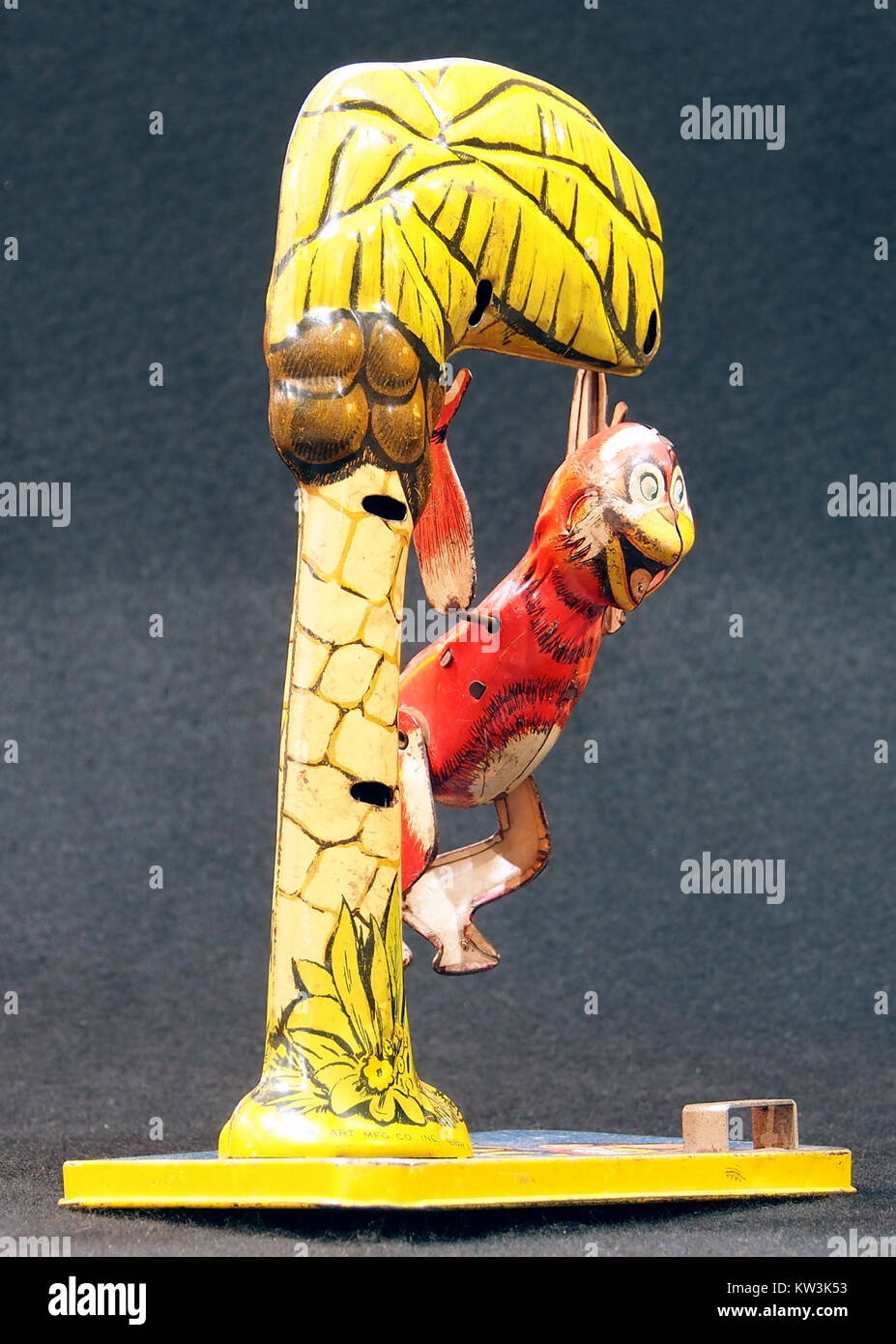 Bombo, tin toy monkey in tree, pic 3 Stock Photo - Alamy