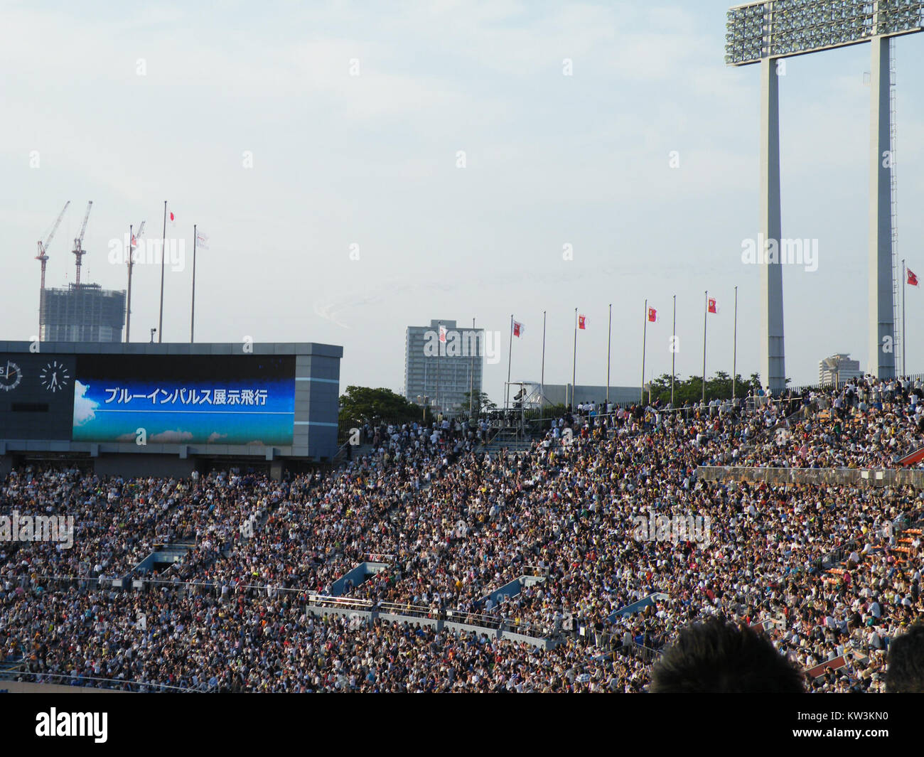 Blue Impulse, Japan's aerobatic team, performs a flyover above the ...