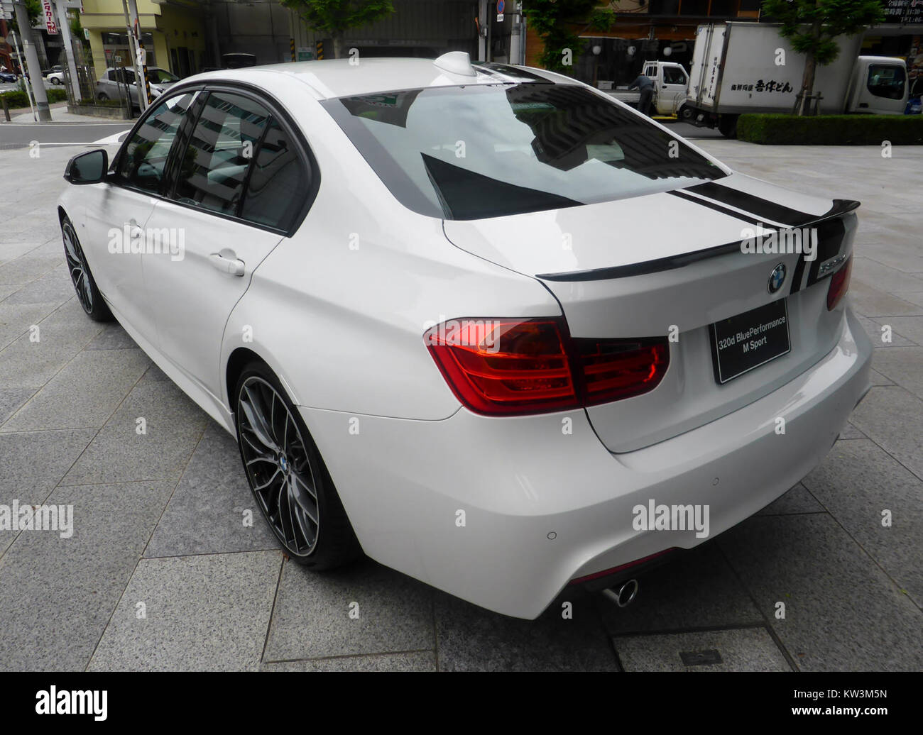 This image shows the rear view of a BMW 320d BluePerformance M Sport ...