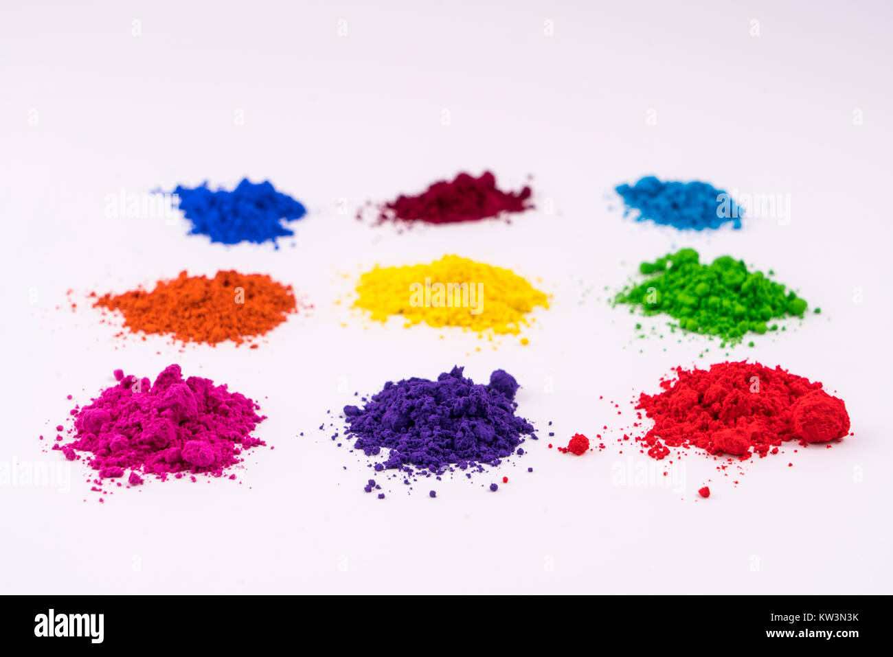 natural multicolored pigments in powder form on a white surface Stock ...
