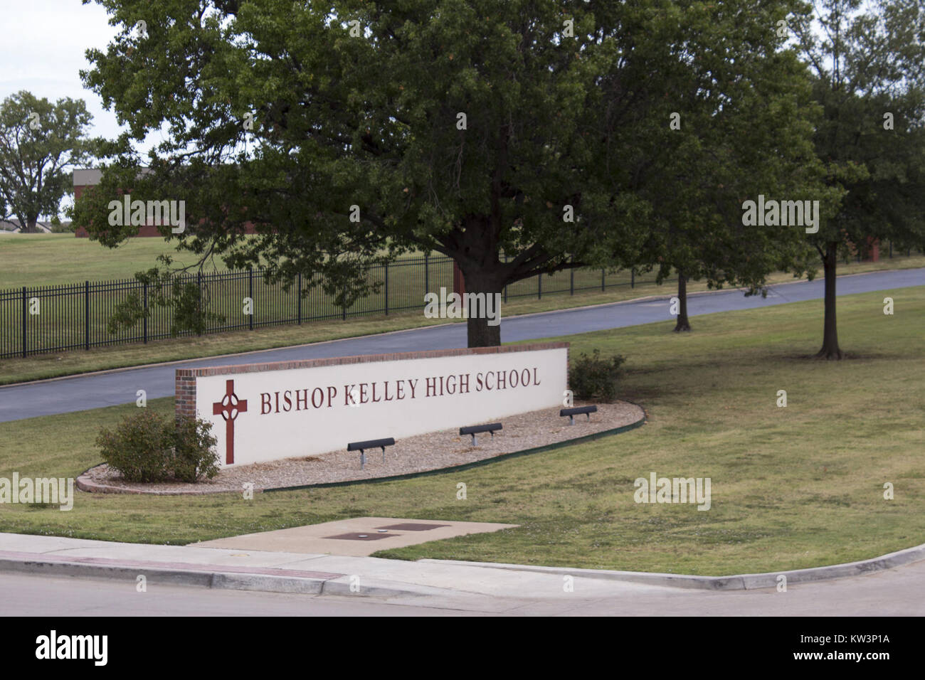 The entrance sign of Bishop Kelley High School, an educational ...