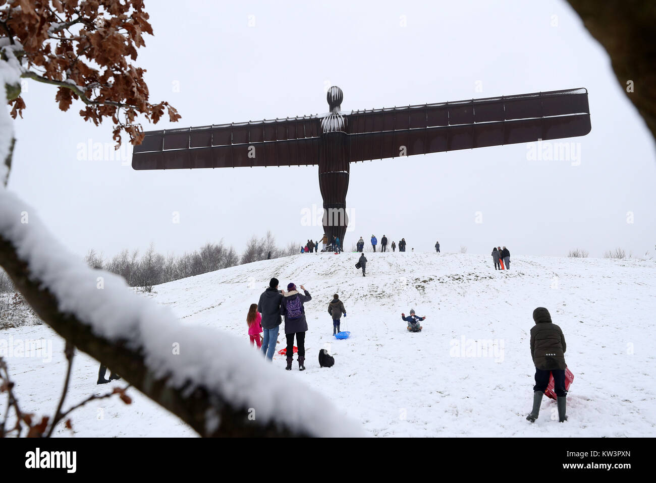 People sledging under the angel of the north in gateshead hi-res stock ...