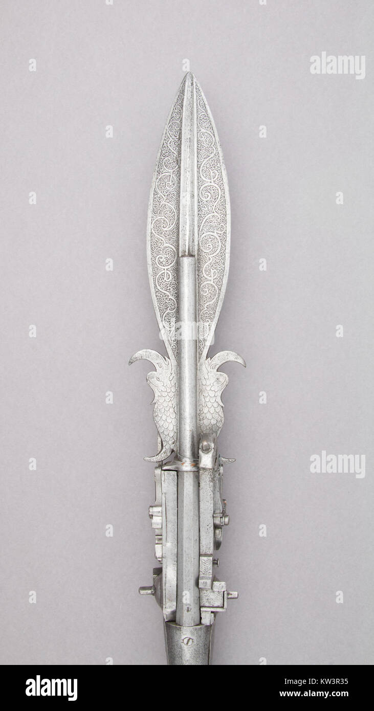 This artifact includes a boar spear paired with a double-barrel ...