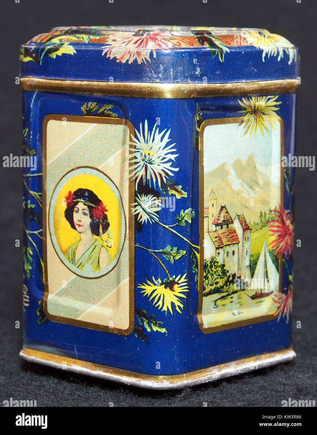 This image features a blue tea tin, showcasing its classic design and ...
