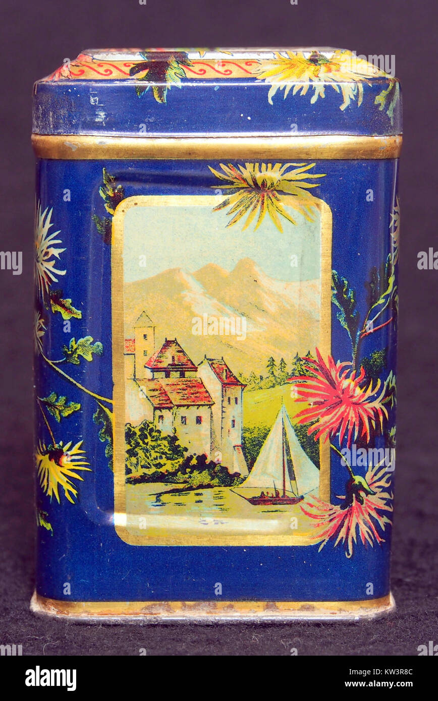 This image features a blue tea tin, showcasing its design and potential ...