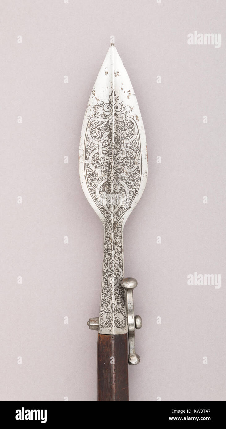 This boar spear, identified as MET 14.25.457, is a historical weapon ...