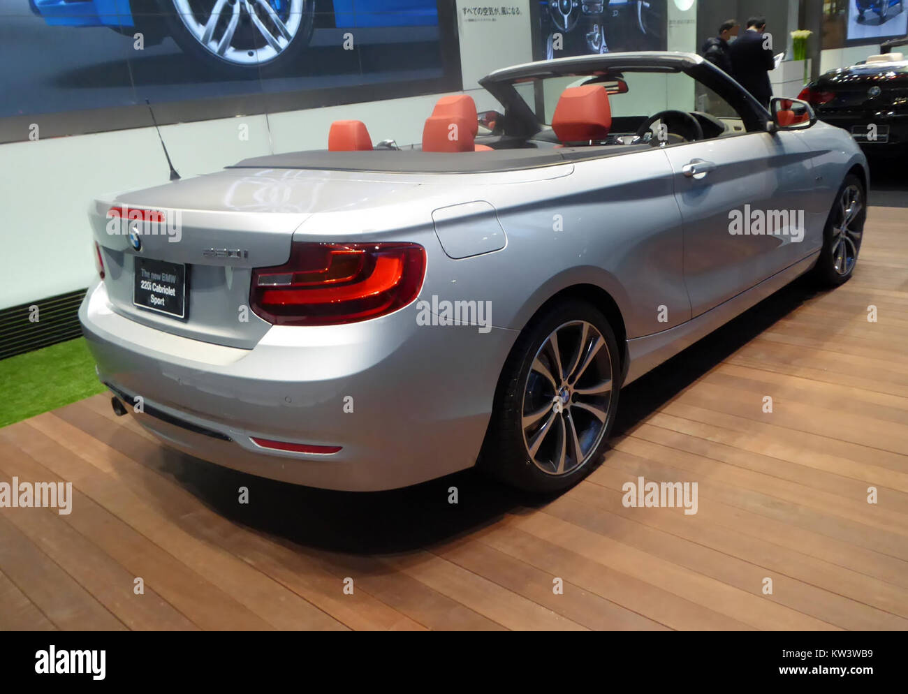 The BMW 220i Cabriolet Sport (F23) rear view emphasizes its sporty and ...