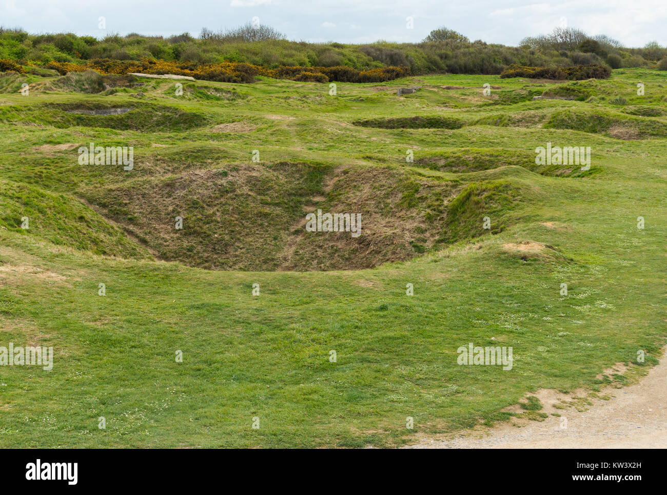 Bombing craters at Pointe du Hoc, a historic site in Normandy, France ...