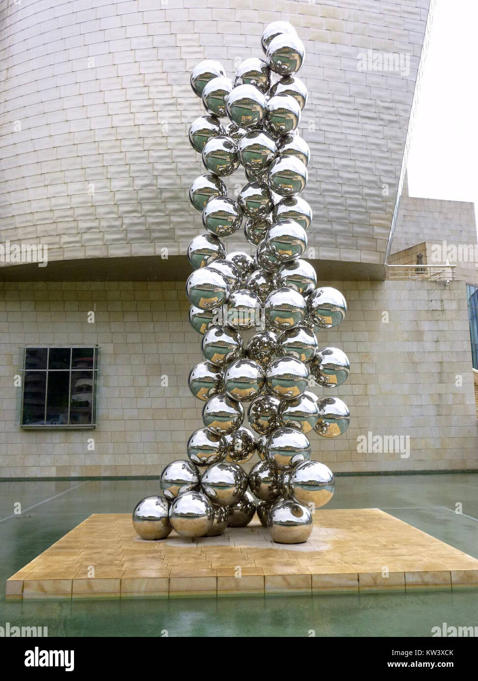 Anish Kapoor's sculpture *Tall Tree and the Eye* is displayed at the ...