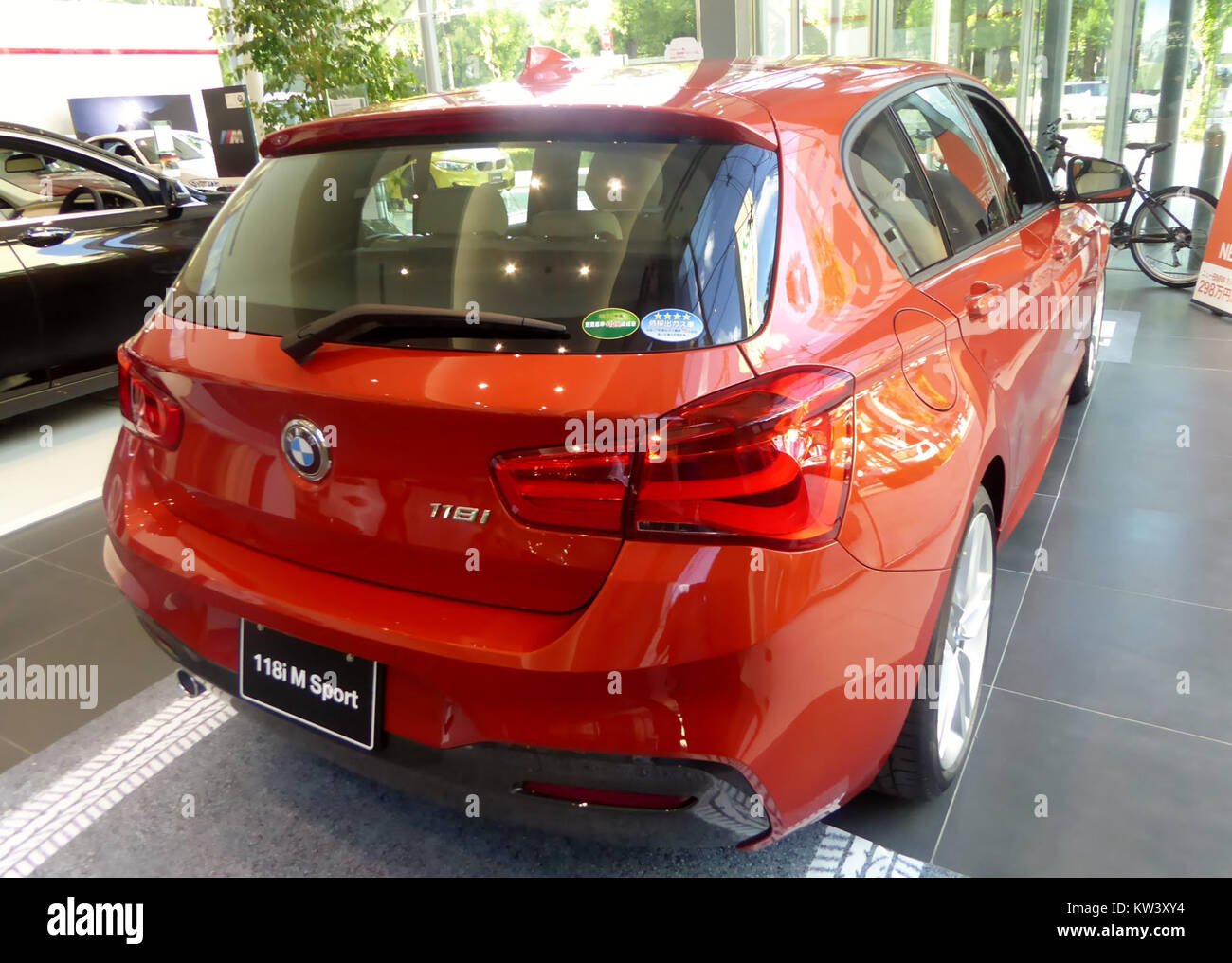 The BMW 118i M Sport (F20) features a rear design characterized by its ...