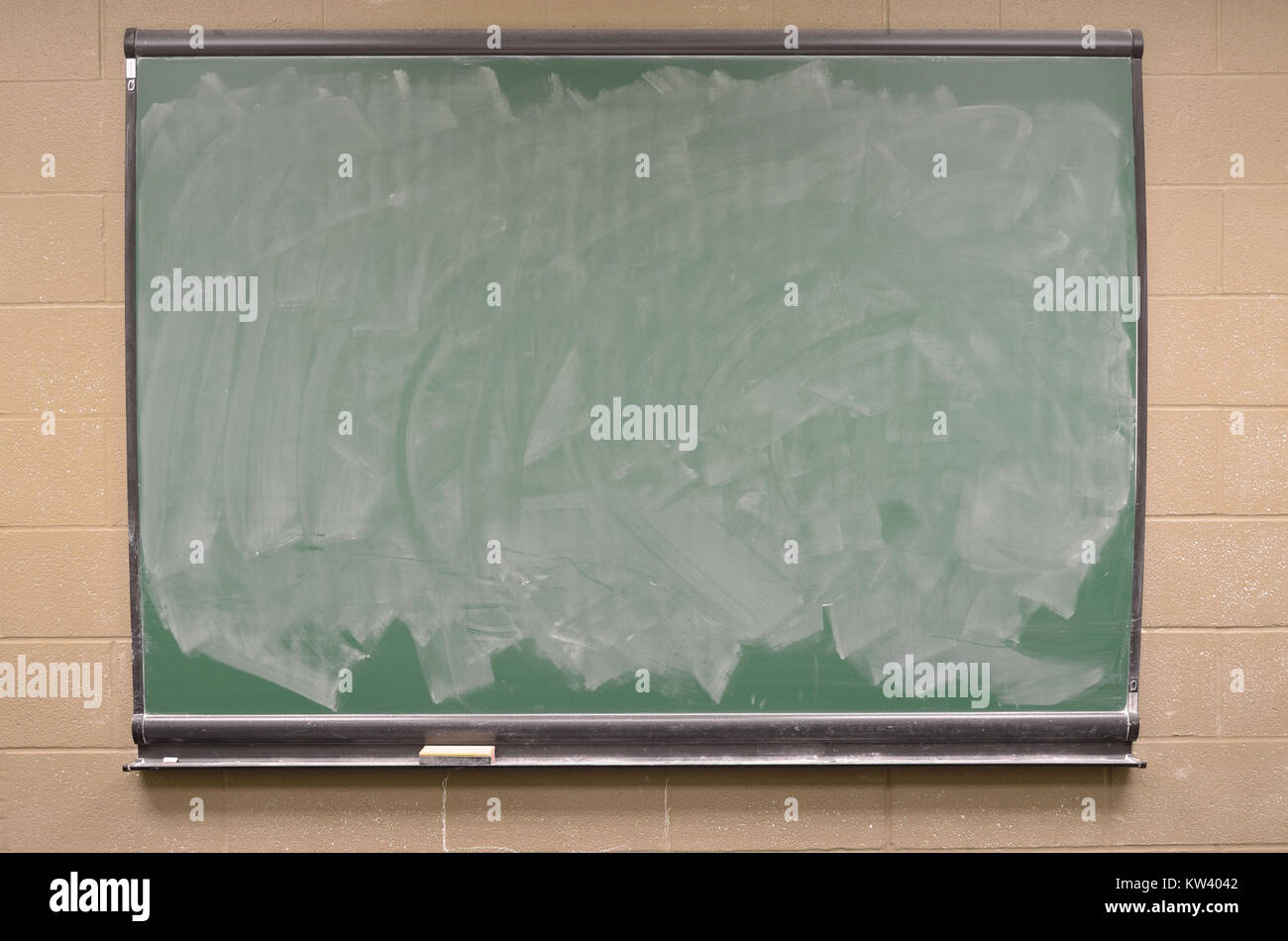 A blank chalkboard serves as a tool for teaching and communication ...