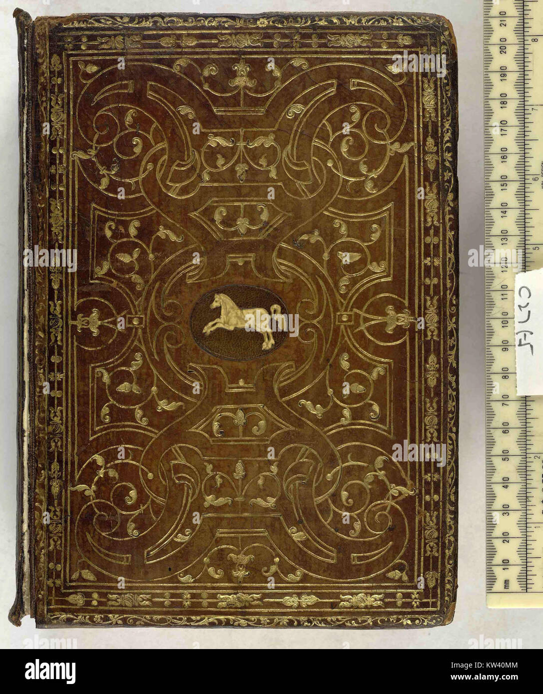 The upper cover of this Biblia (a type of Bible) showcases intricate ...