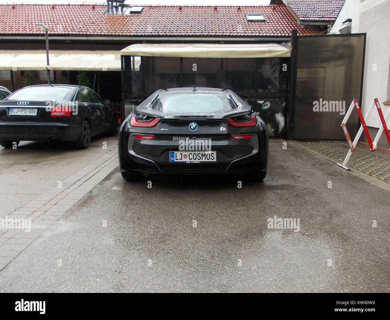 The BMW i8 is a plug-in hybrid sports car that combines futuristic ...