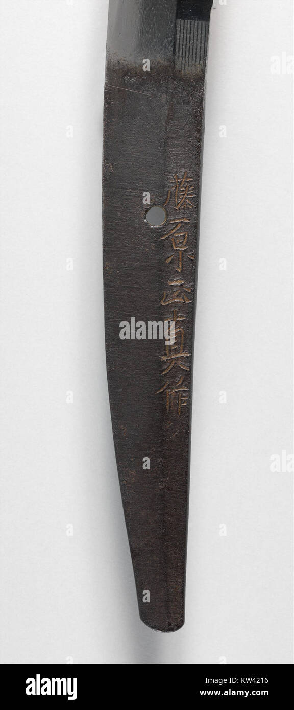 This image features a katana blade, a traditional Japanese sword known ...