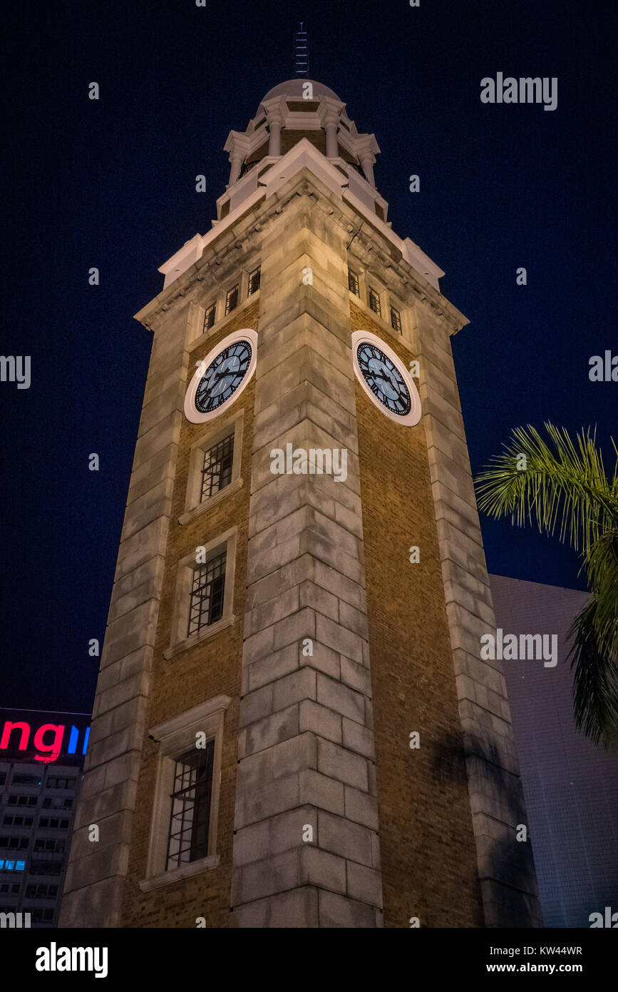 hong kong tsim sha tsui clock tower at night Stock Photo - Alamy