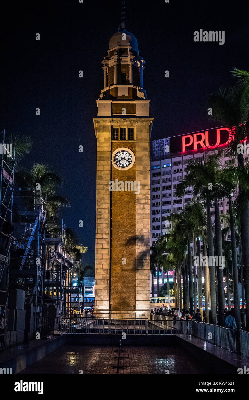 hong kong tsim sha tsui clock tower at night Stock Photo - Alamy