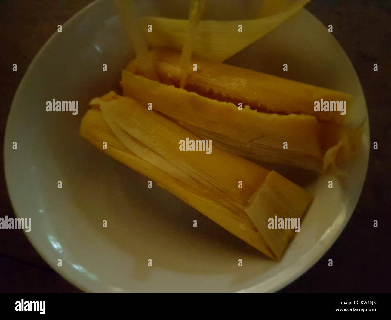 Binaki is a traditional Filipino dish, often prepared as a steamed corn ...