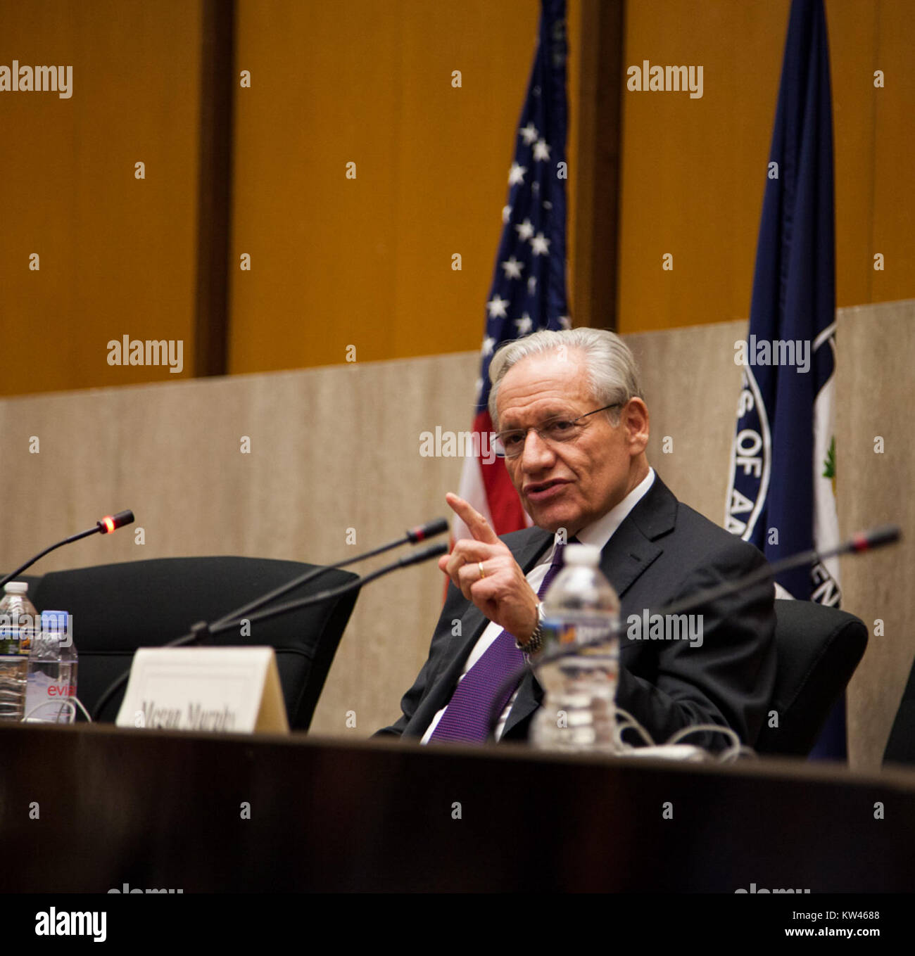 Photograph capturing journalist Bob Woodward meeting with participants ...