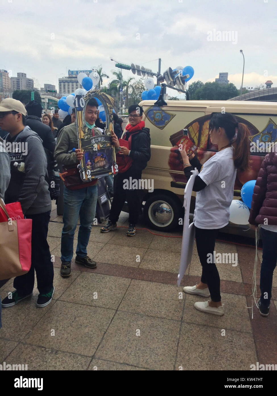 A photograph capturing a female staff member of Bizzard, taking a ...