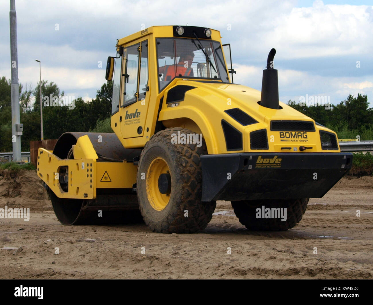 The Bomag BW211D is a heavy-duty compactor used in construction for ...