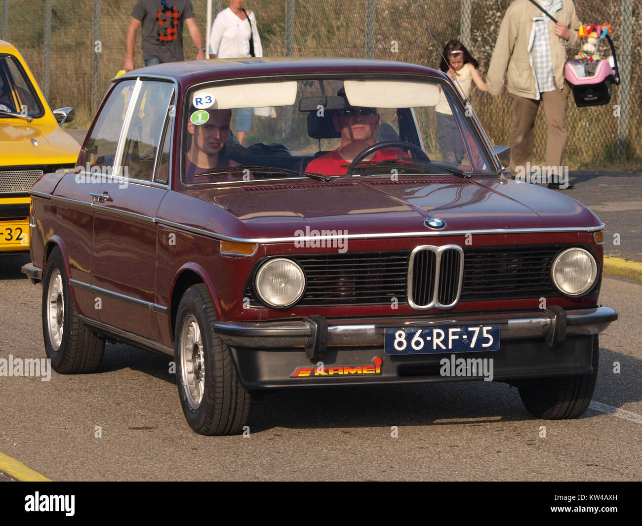 The BMW 1602, featured in this image, is a classic German automobile ...