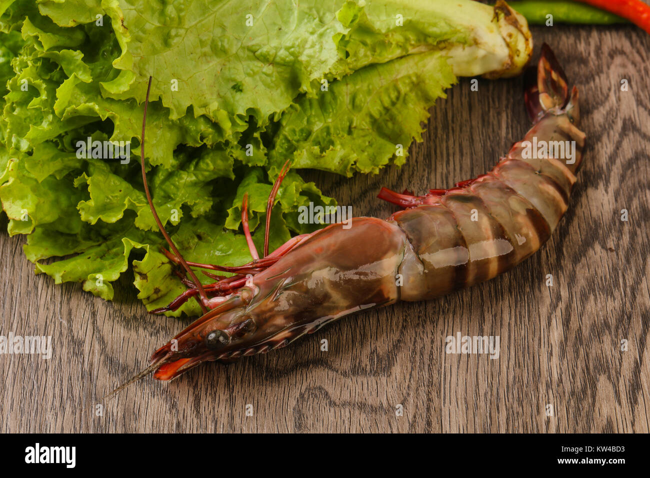 Raw big tiger prawn - ready for cooking Stock Photo - Alamy