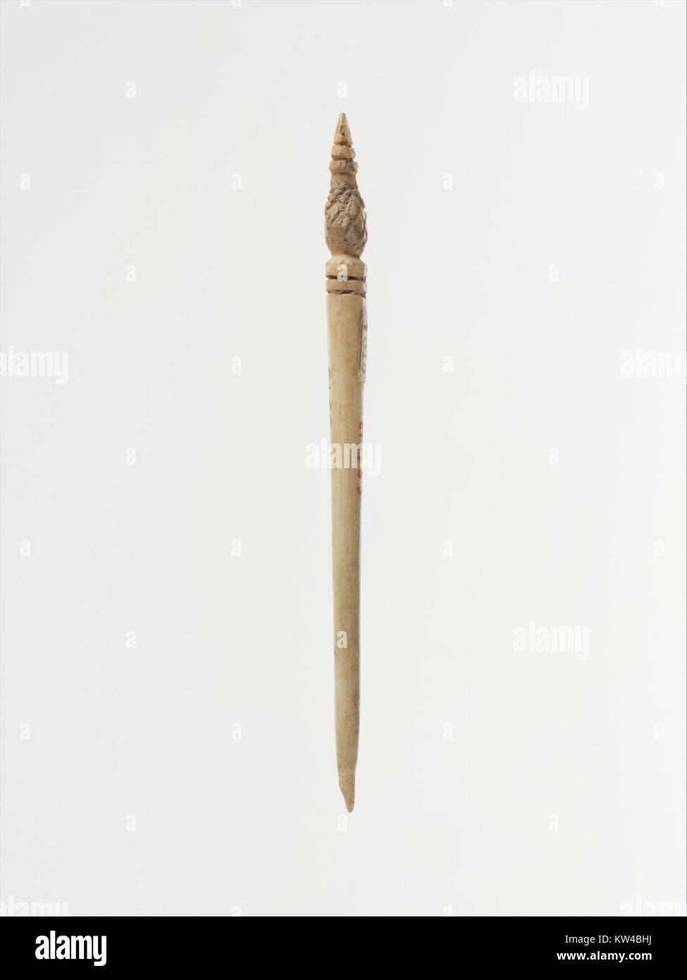 This bone hairpin, dating from the early centuries, is a decorative and ...