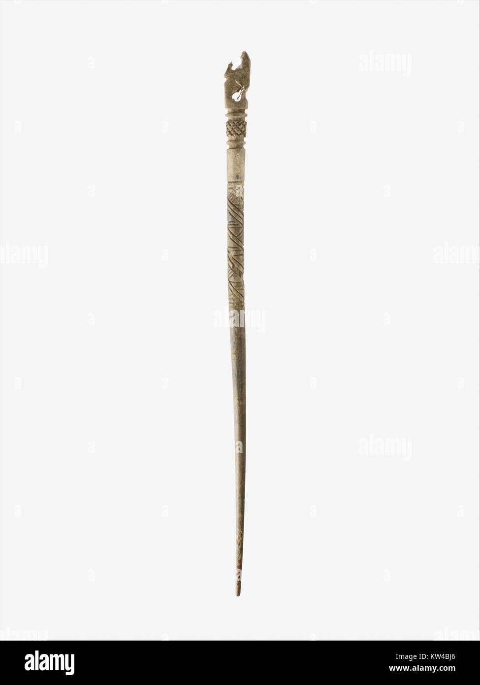This bone pin, housed in the collection of The Met, dates back to ...