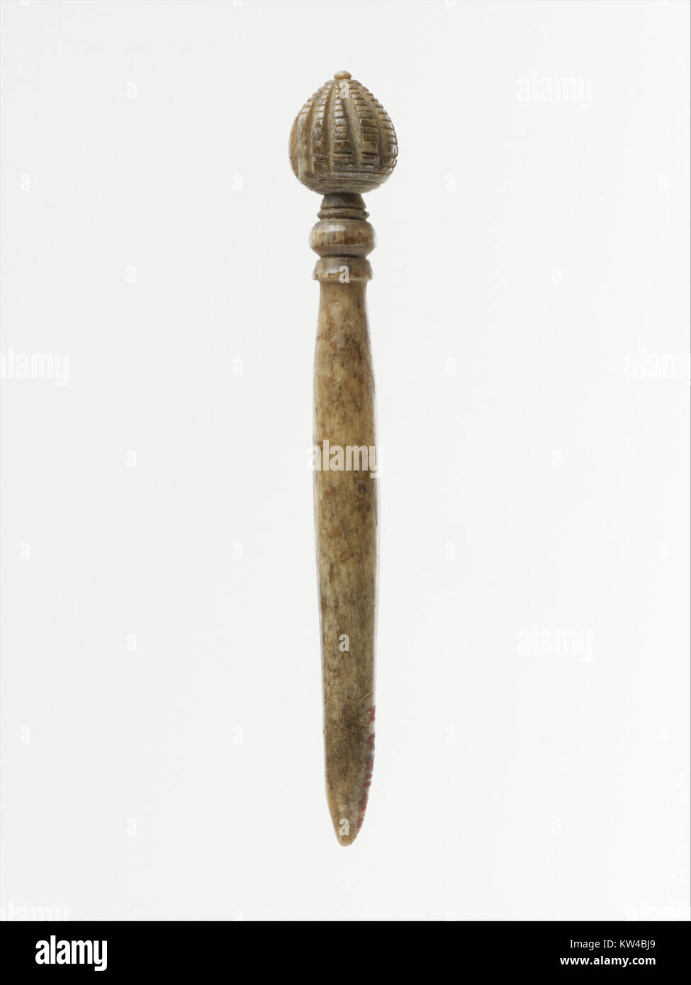 This bone pin, part of the MET collection, is an example of early ...