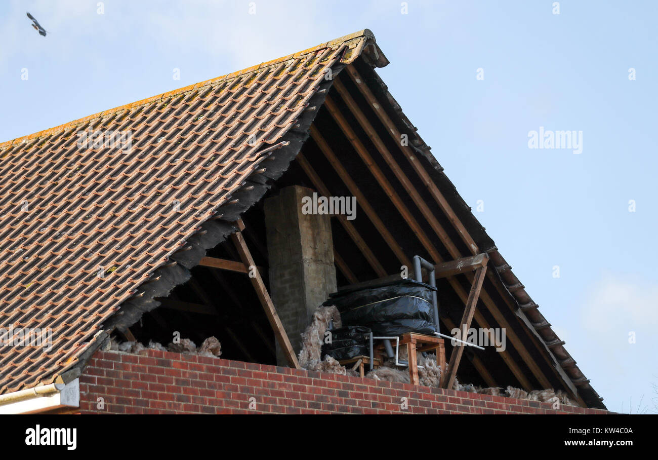 A view of damage to the gable end of a house in East Boldre, Hampshire ...