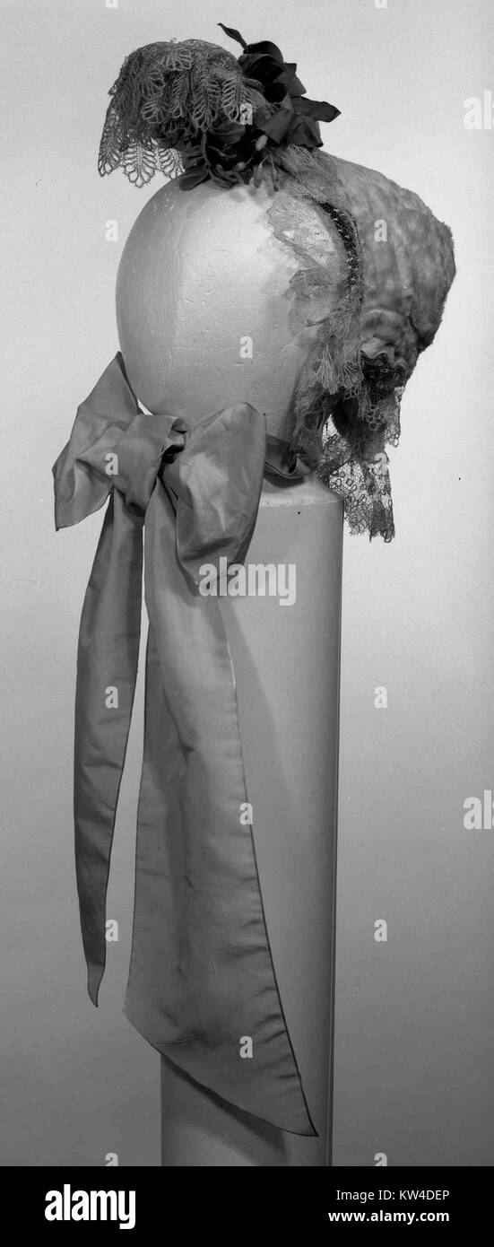 Black and white image of a bonnet labeled MET 19.166.8, highlighting ...