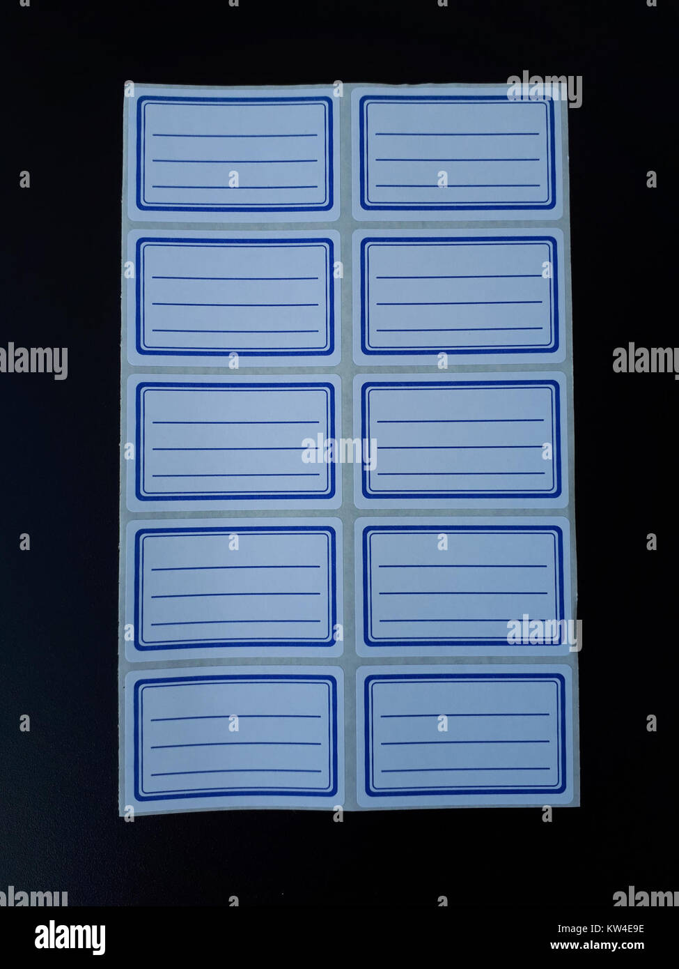 Blue color cast adhesive labels are commonly used for organizing and ...