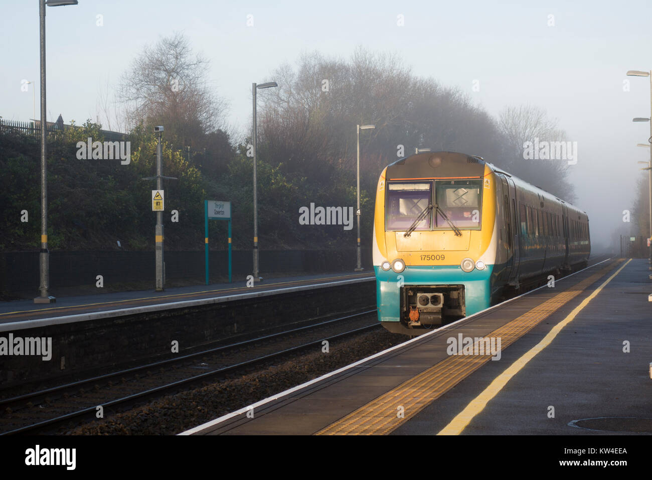 Gowerton train station on a misty morning Stock Photo - Alamy