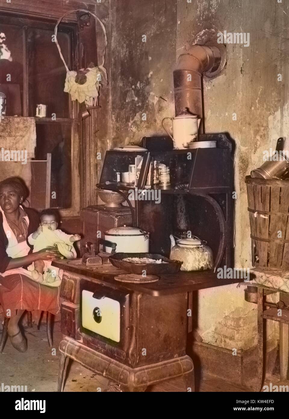 African american mother and child in a slum kitchen, Washington, DC ...