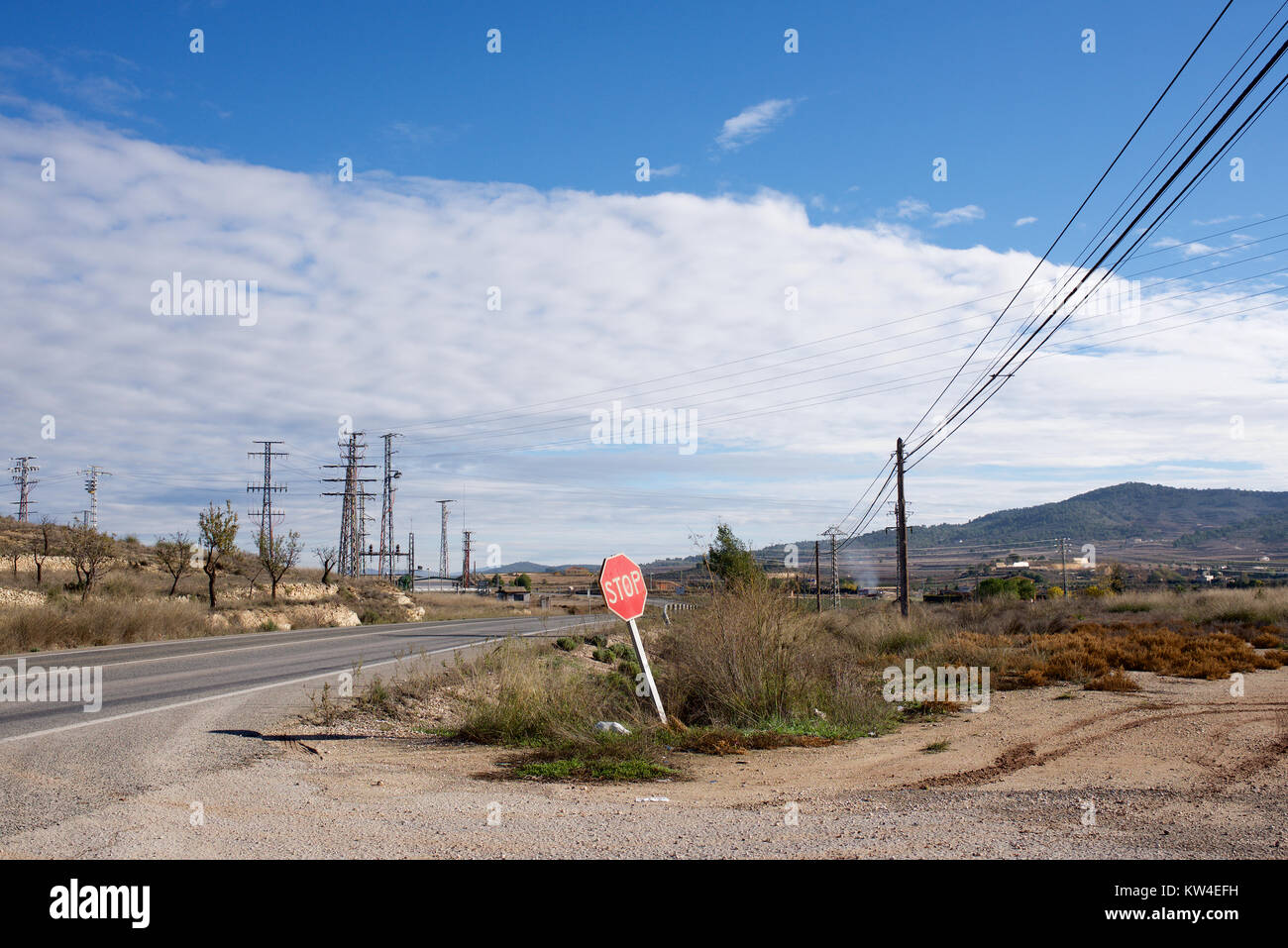 Country road and STOP sign in red Stock Photo - Alamy