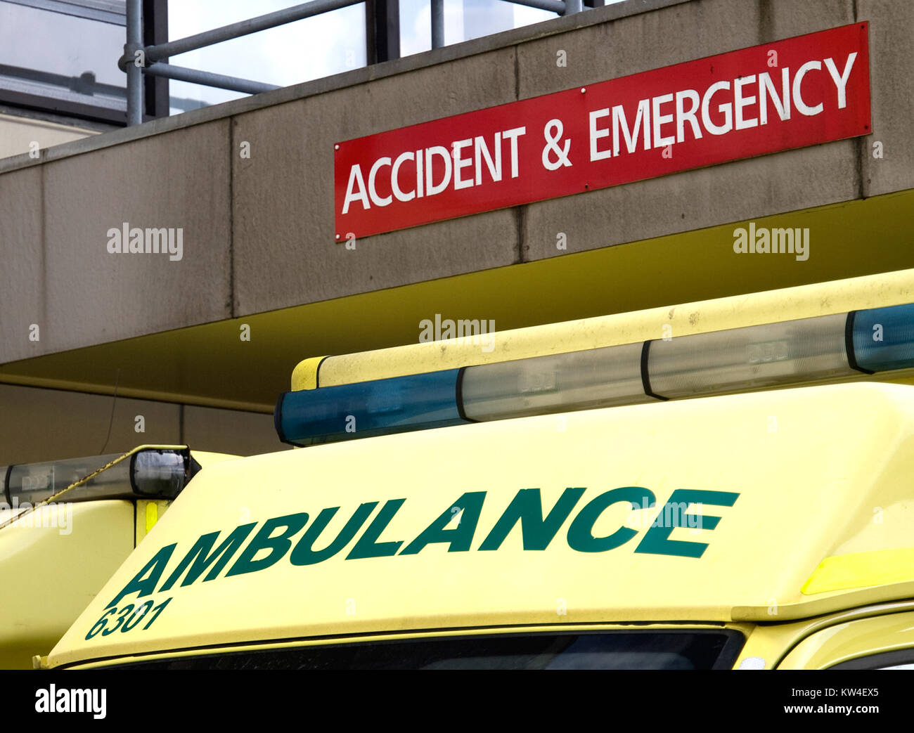 Roof of an ambulance cab showing light bar and ambulance signage parked ...