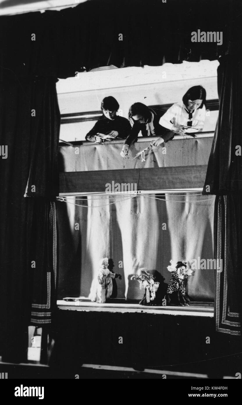 Children perform puppet show Black and White Stock Photos & Images - Alamy