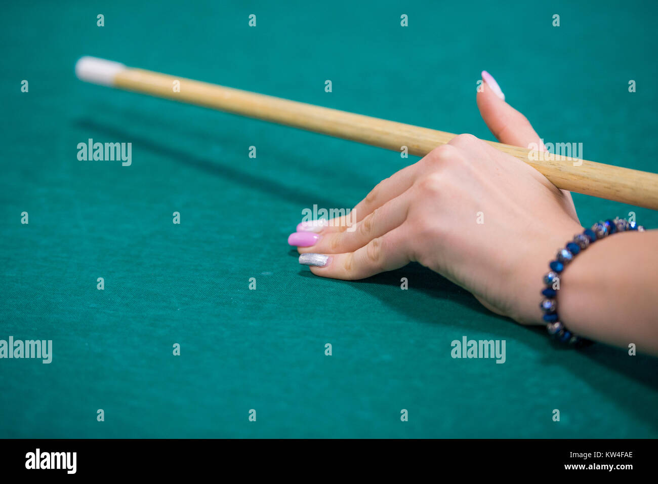 Woman hands on billiard table playing Stock Photo - Alamy