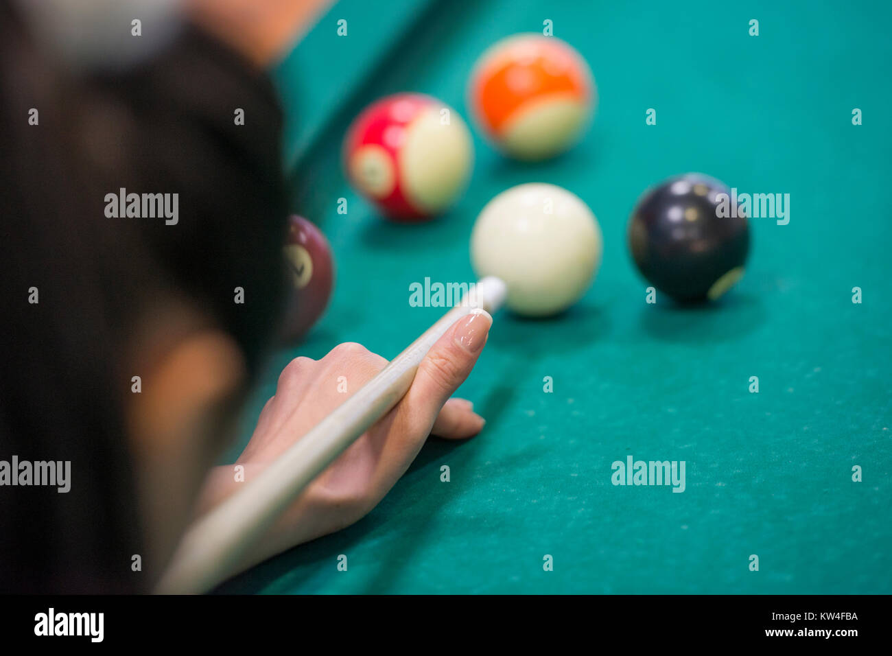 Playing billiard pool game hi-res stock photography and images - Alamy