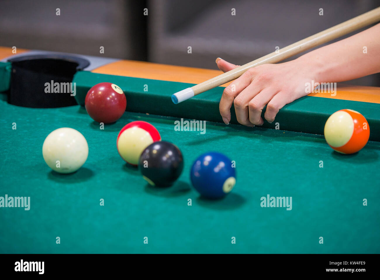 Woman hands on billiard table playing Stock Photo - Alamy