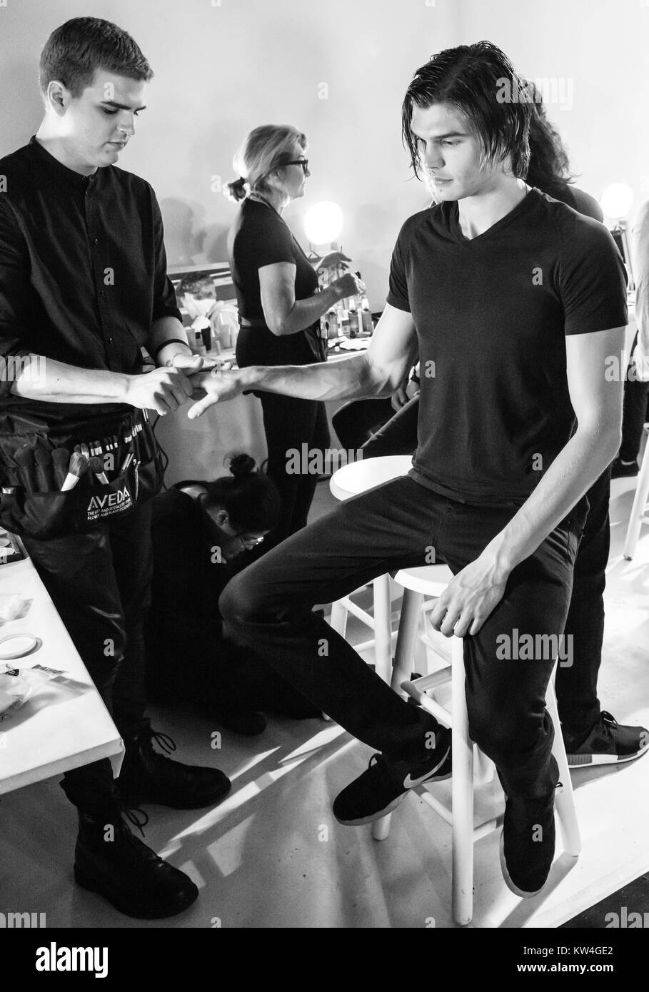 NEW YORK, NY - JULY 11, 2017: A model prepares backstage for the Nick ...