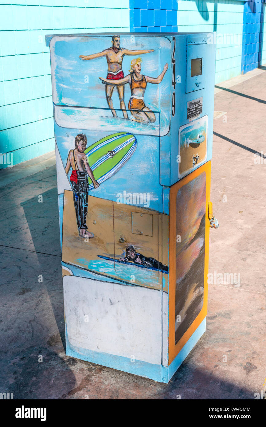 Artwork depicting surfers on an electrical box on a sidewalk in Pismo ...