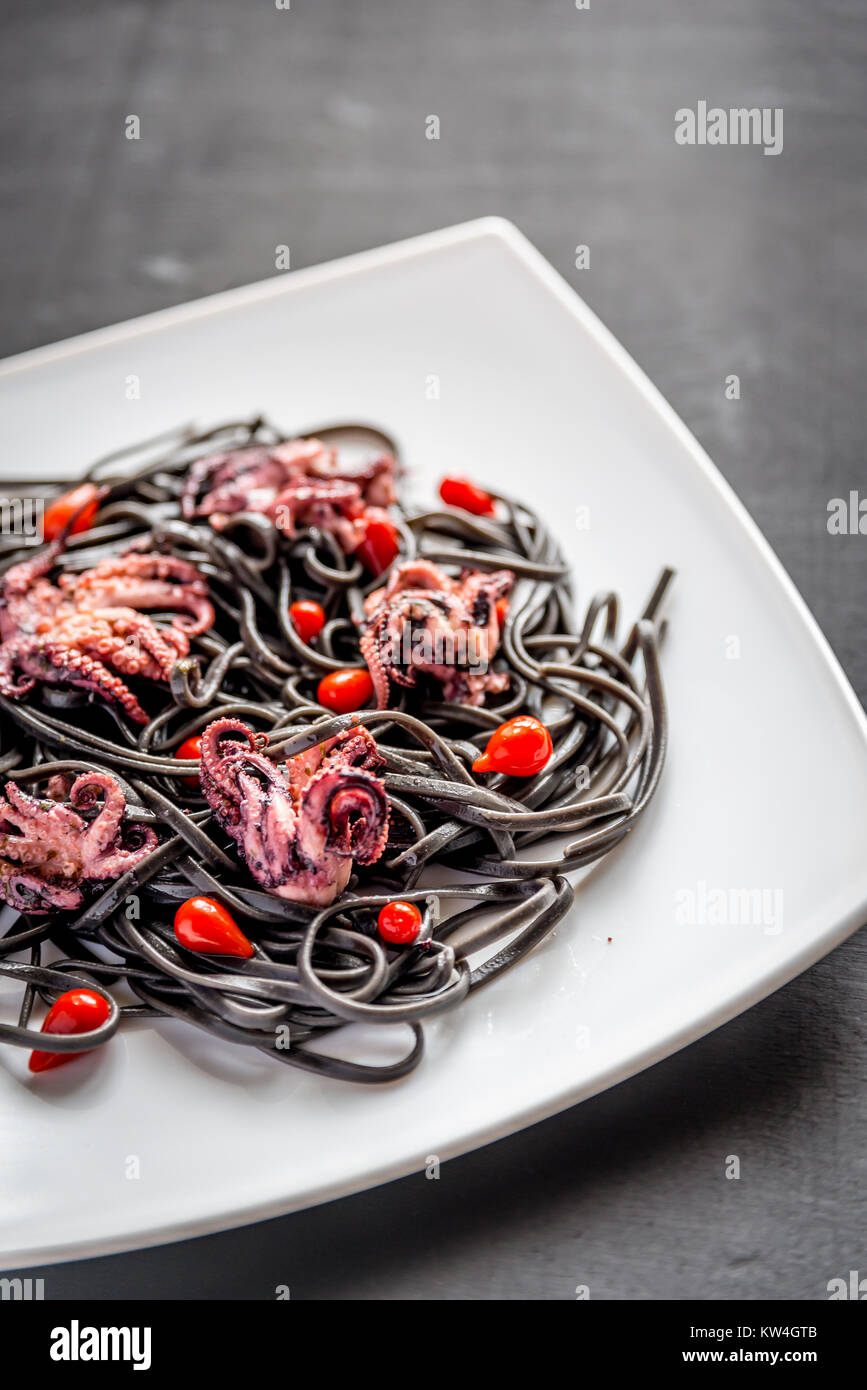 Pasta with wheat germ and black cuttlefish ink Stock Photo - Alamy