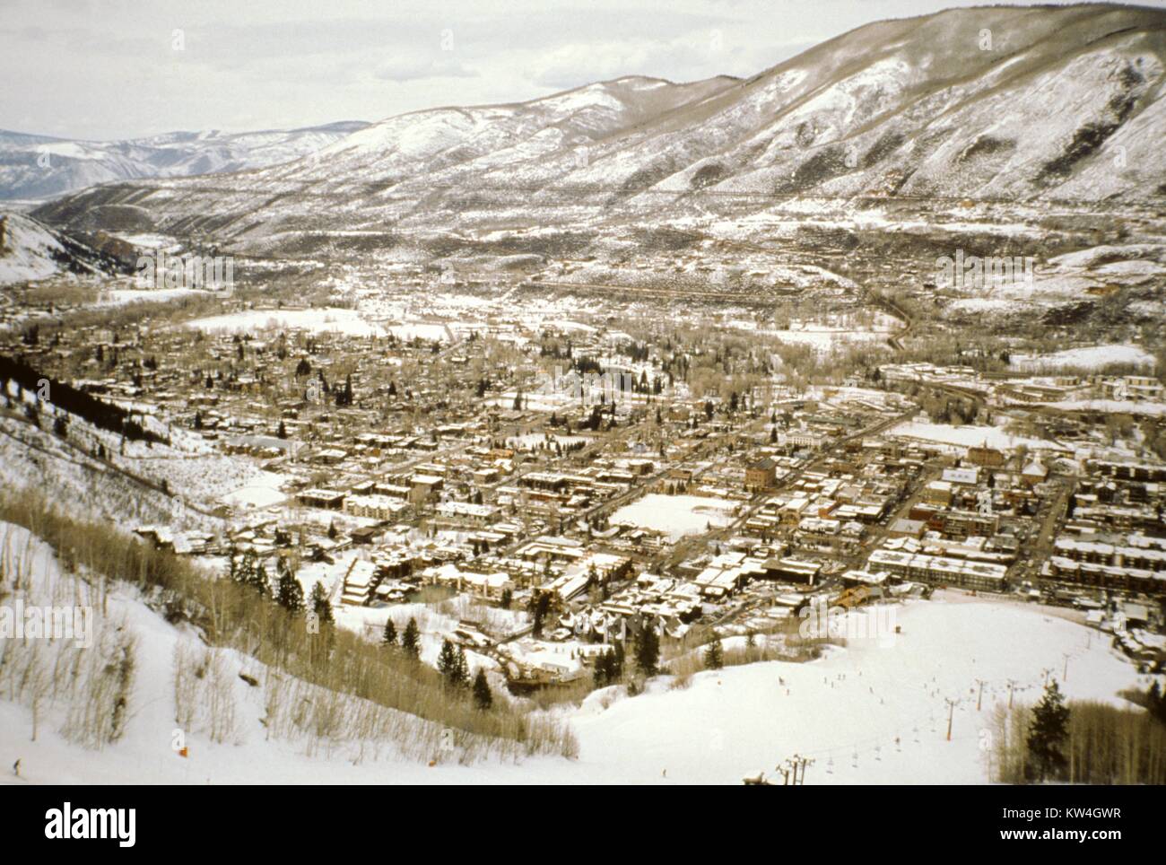 Aerial view from a mountain top of ski resorts and other buildings in ...