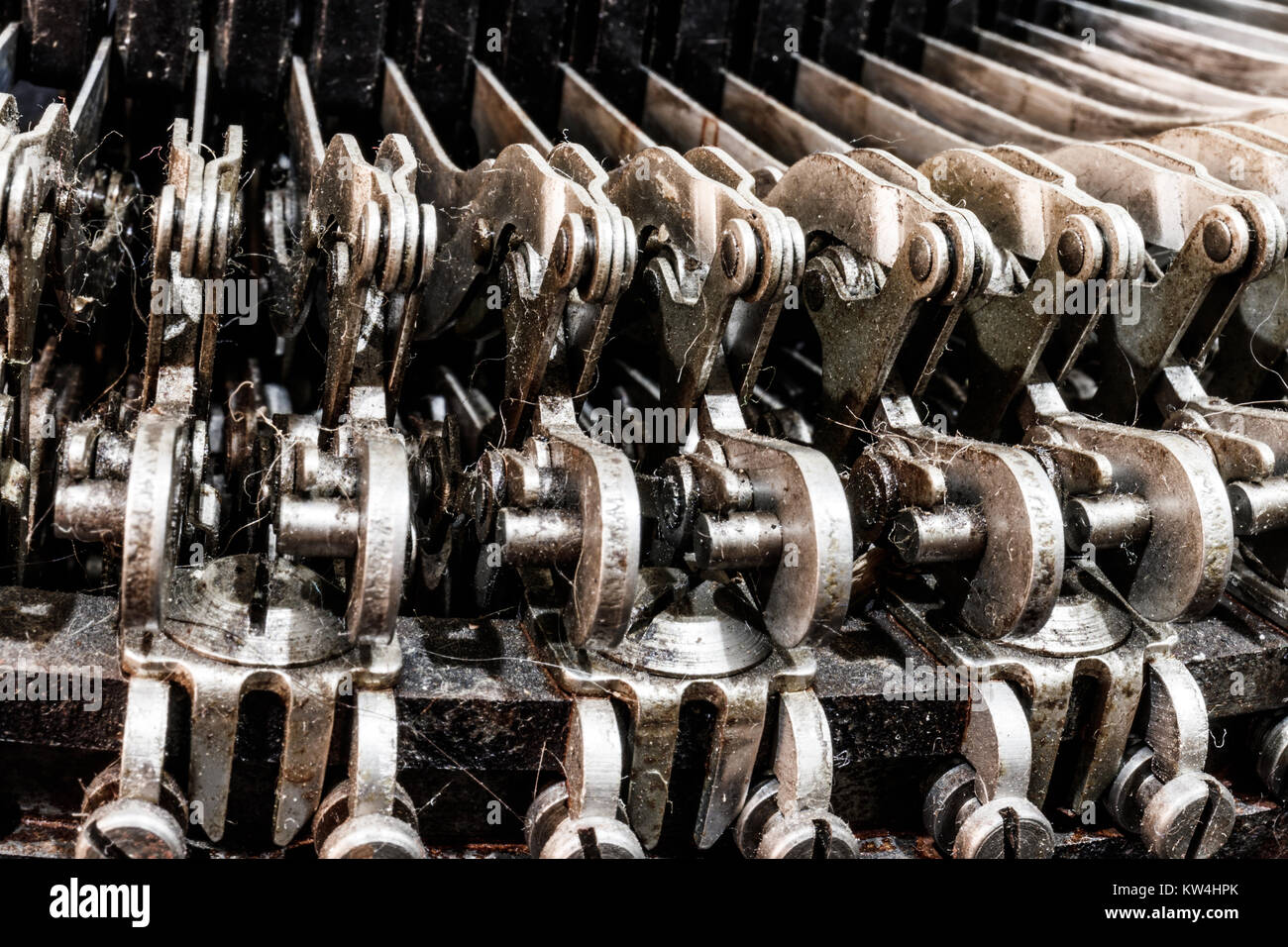 Antique typewriter mechanical typebar slide. Each key connects to a ...