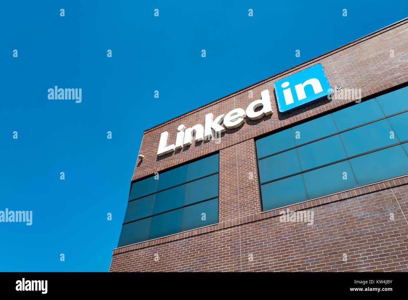 View of main building with logo and signage at the headquarters of ...