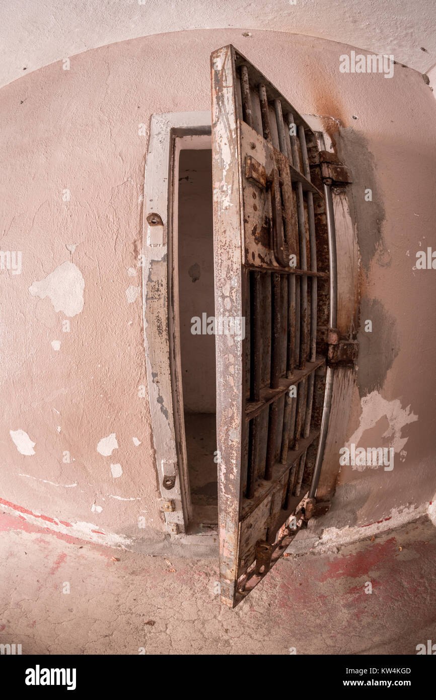 Bid steel door that is apart of a prison cell Stock Photo - Alamy