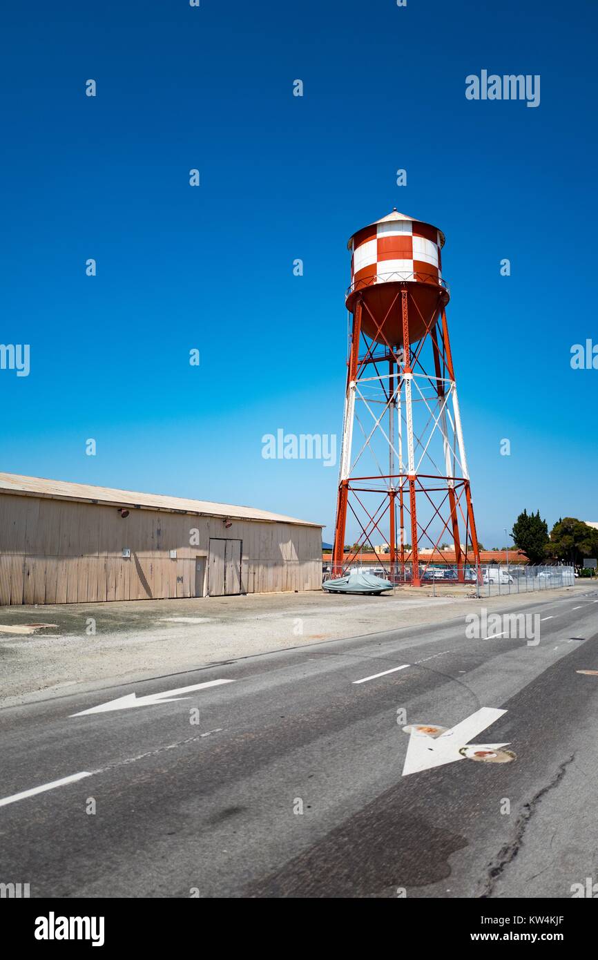 Red and white water tower, with road and arrow markings, within the ...