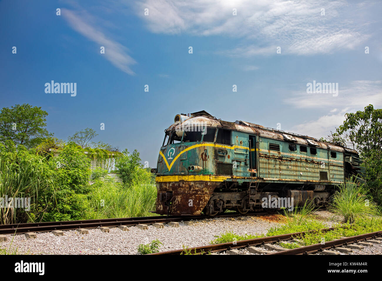 An old abandoned train locomotive at a railway station in Guilin ...